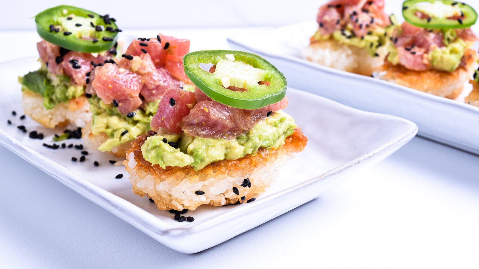 Crispy Rice Stacks with Spicy Tuna and Avocado - Delicious Dish