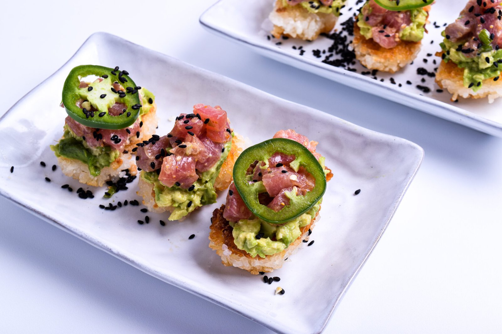 Crispy Rice Stacks with Spicy Tuna and Avocado - Delicious Dish
