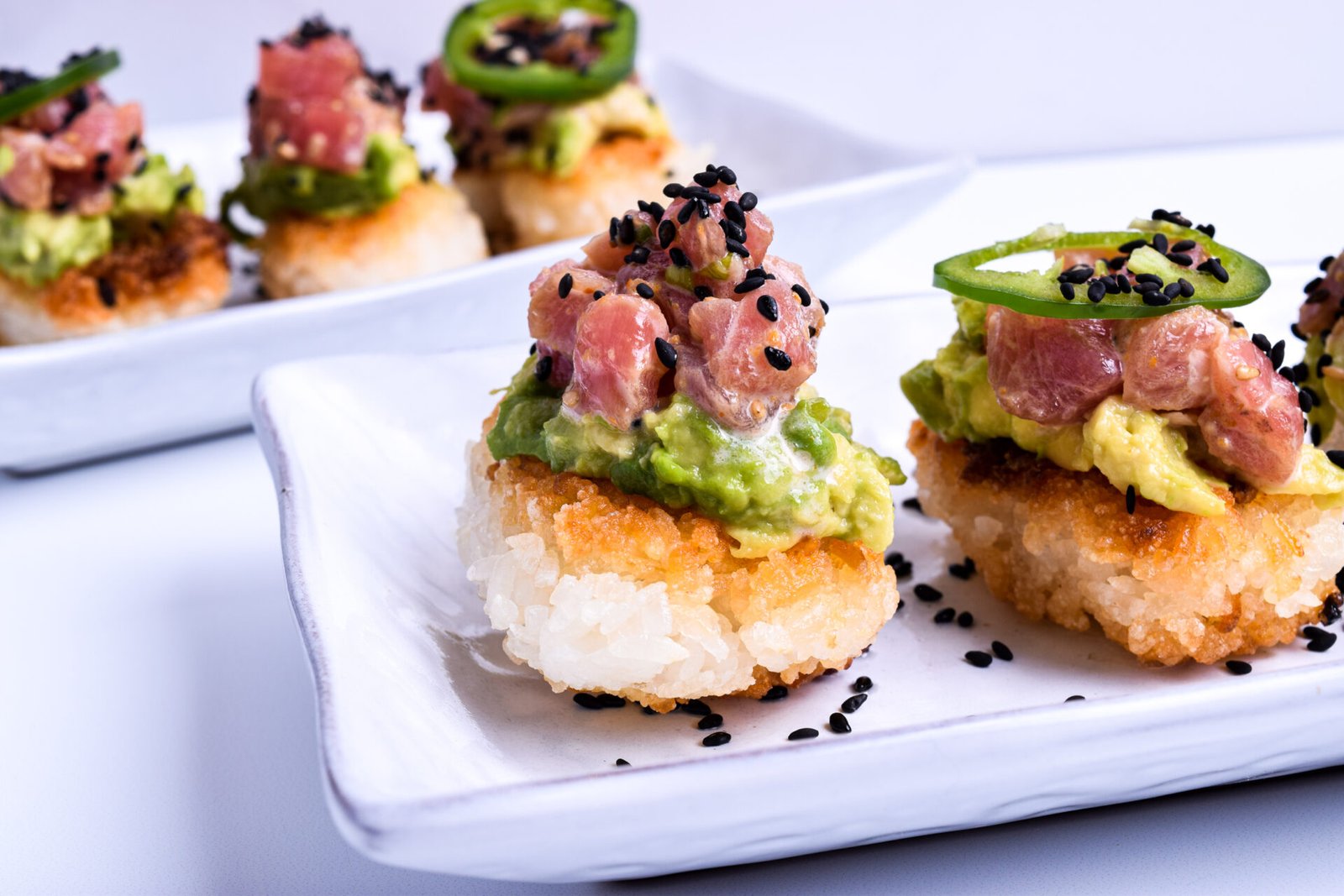 Crispy Rice Stacks with Spicy Tuna and Avocado - Delicious Dish